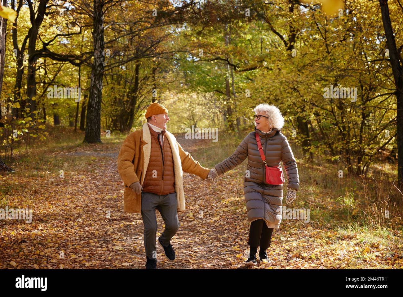 Mature couple walking in fall hi-res stock photography and images - Alamy
