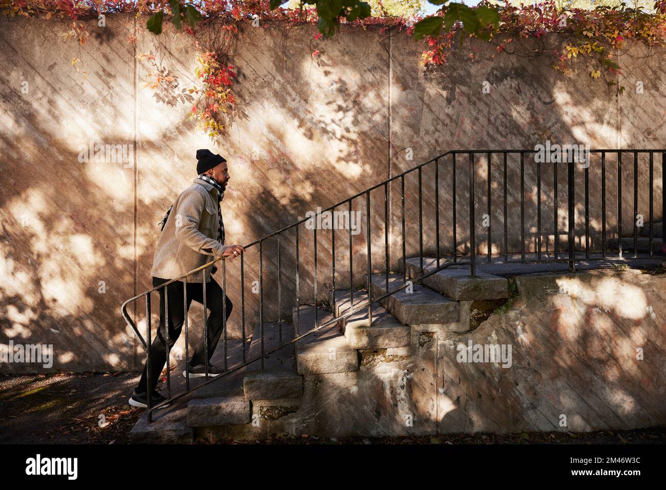 Man going upstairs hi-res stock photography and images - Alamy