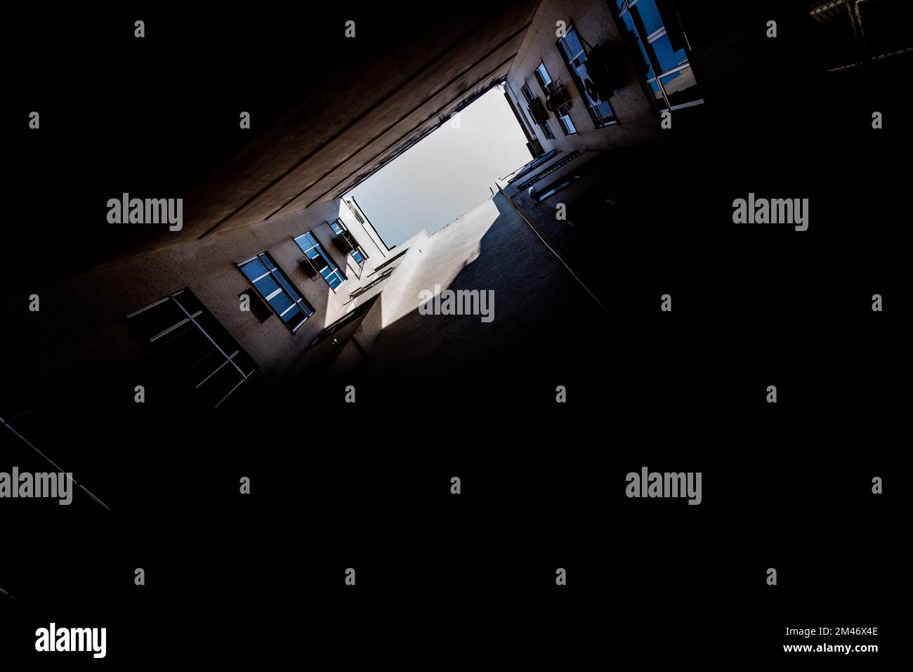 A low-angle shot of an inner yard of a building Stock Photo - Alamy