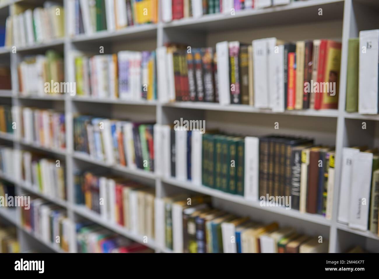 blurred bookshelf in library for your background design Stock Photo - Alamy