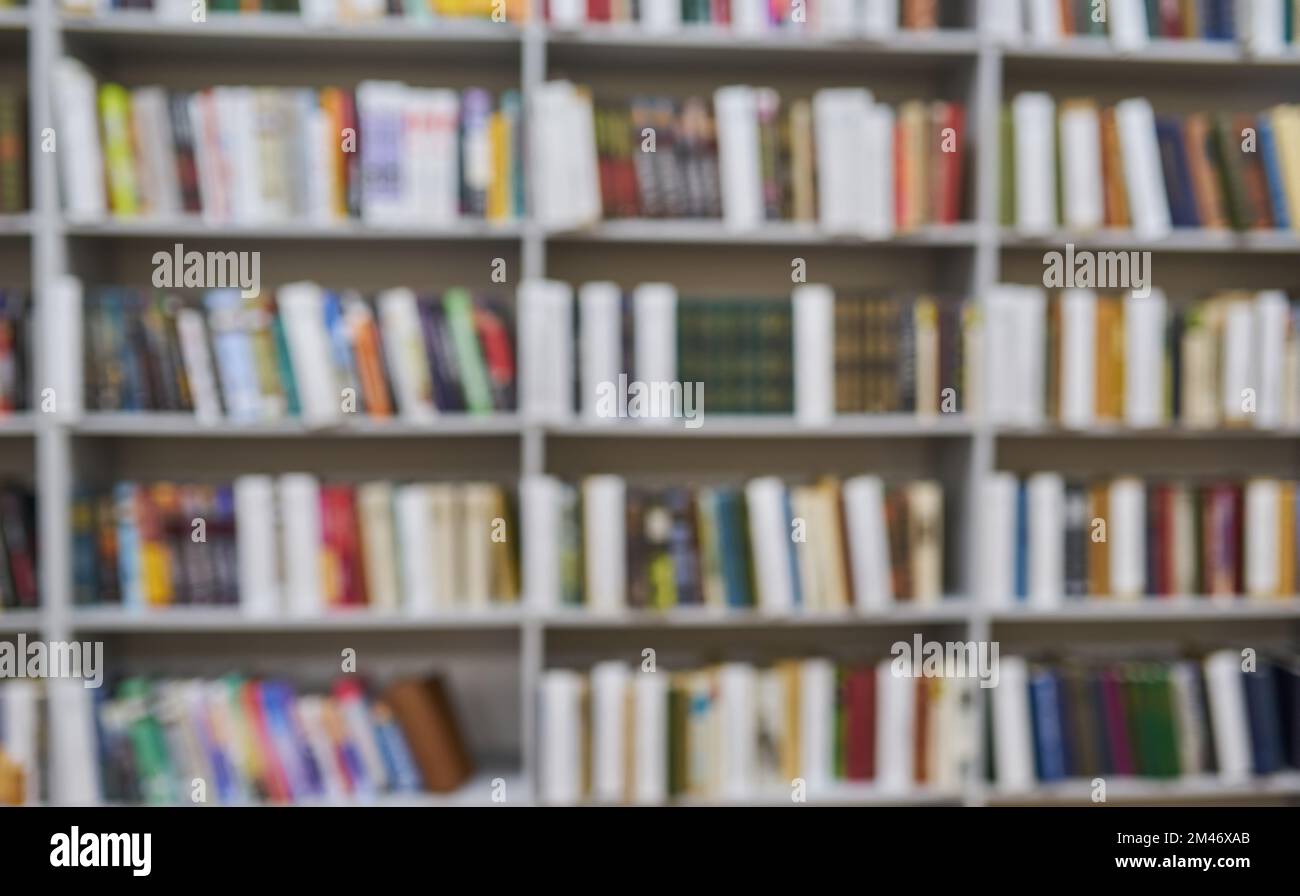 blurred bookshelf in library for your background design Stock Photo - Alamy