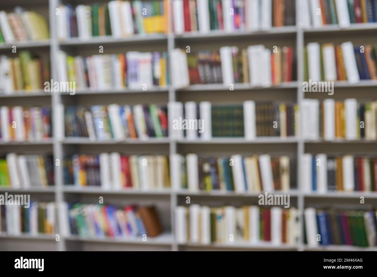 blurred bookshelf in library for your background design Stock Photo - Alamy