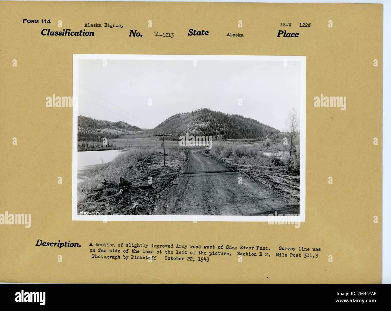 A section of slightly improved Army road west of Snag River Pass ...