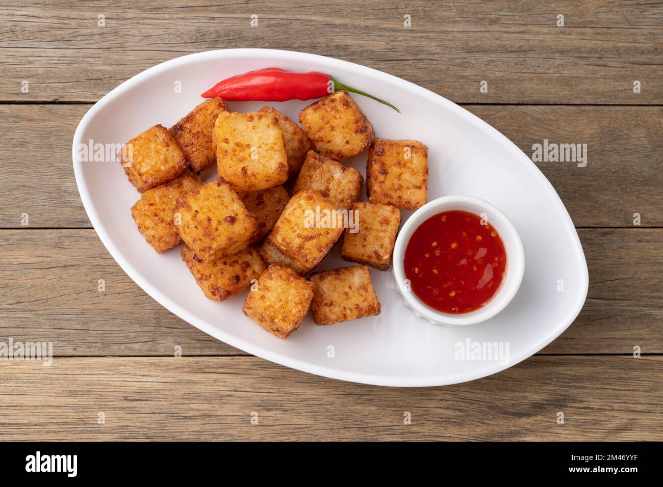 Tapioca dice, typical northeast brazilian food with chilli pepper syrup ...