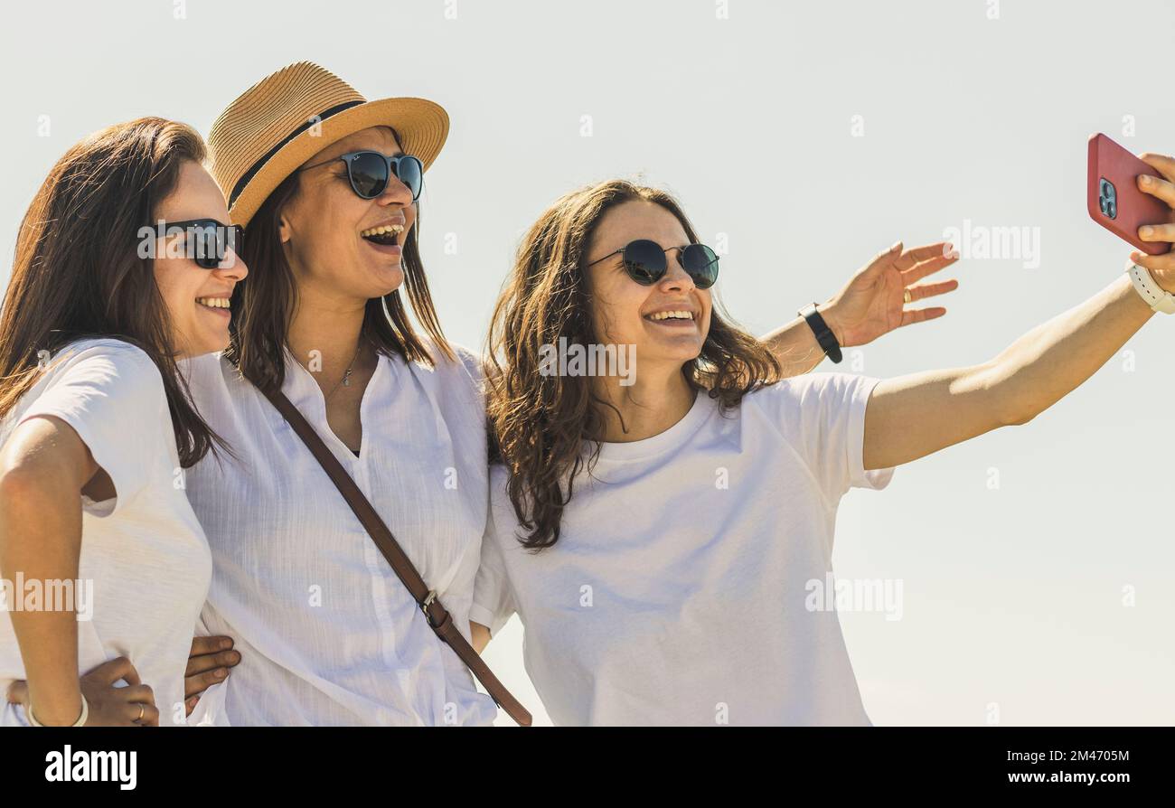 Three happy women taking selfie hi-res stock photography and images - Alamy