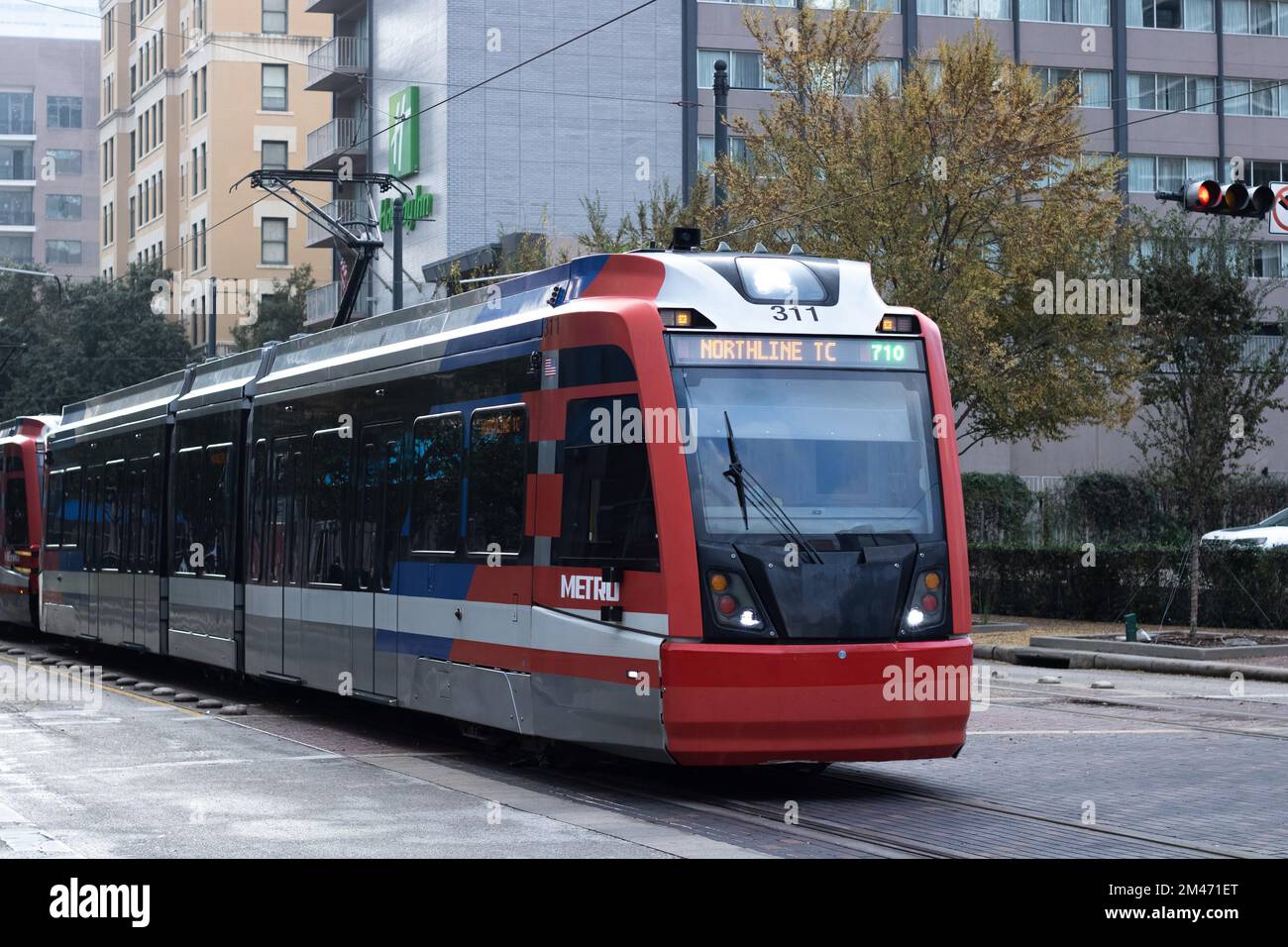 Houston Metro shuttle train moving on train Stock Photo - Alamy