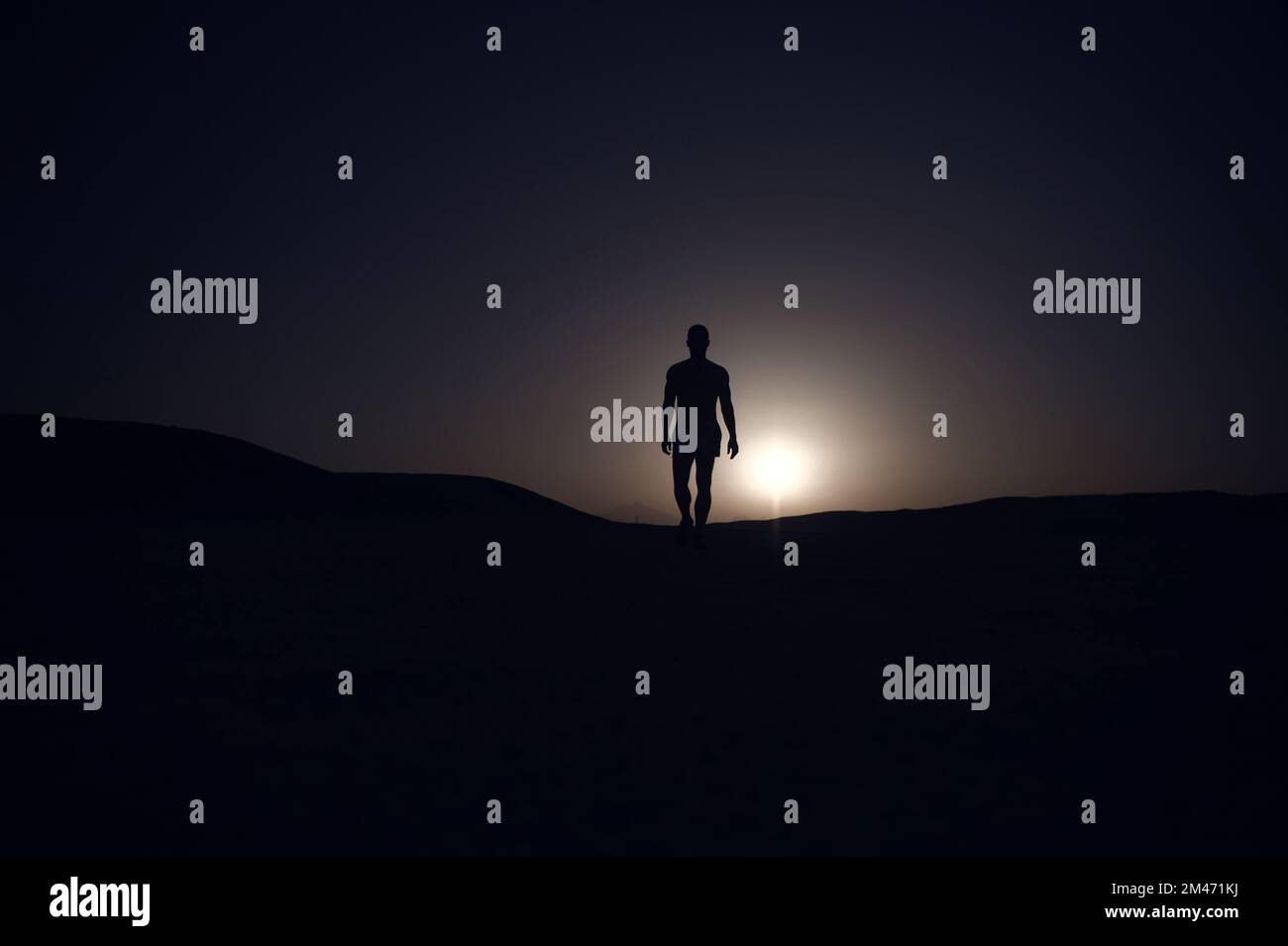 walking man silhouette at sunset sky Stock Photo - Alamy