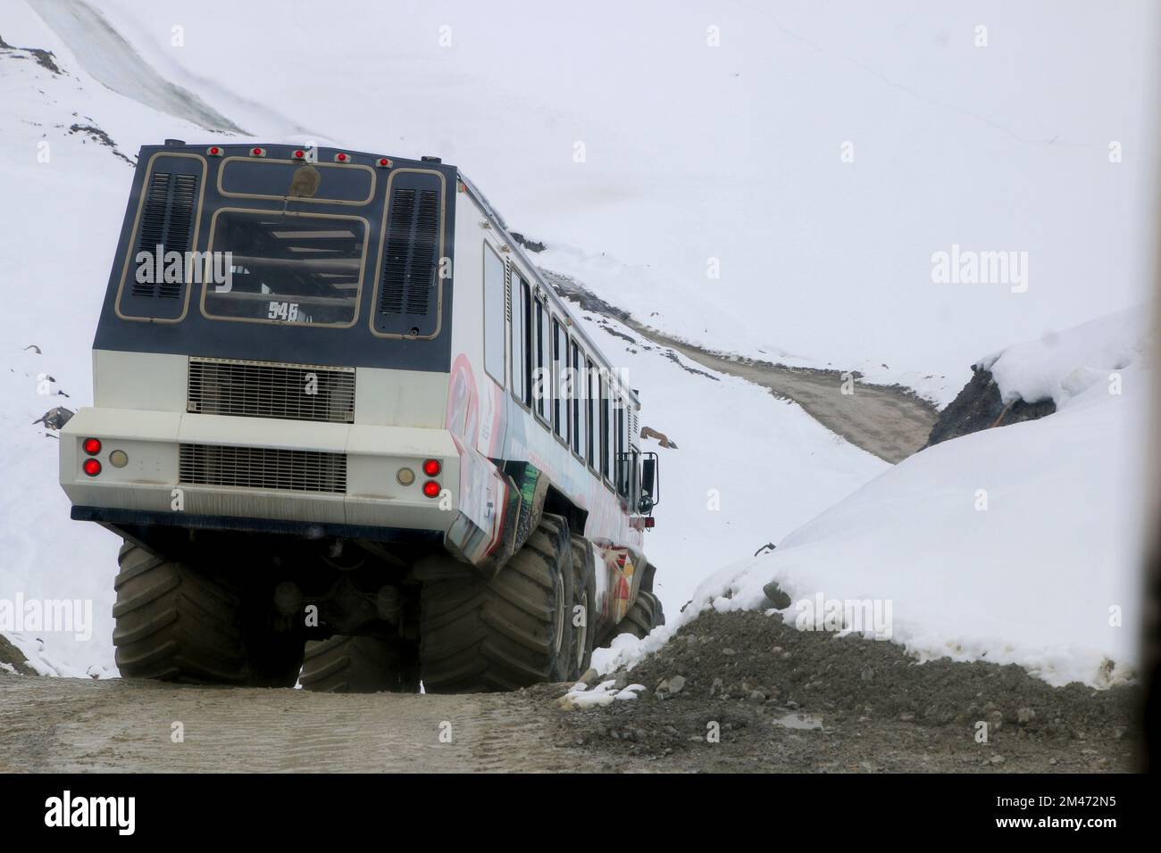 Ice explorer vehicle on Athabasca glacier from icefield parkway, Jasper national park, Alberta ...