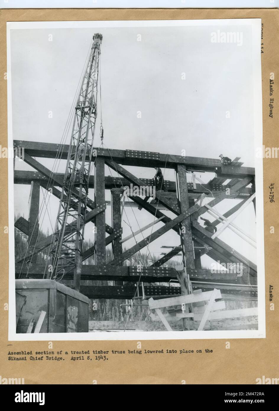 Constructing Sikanni Chief River Bridge. Original caption: Assembled ...
