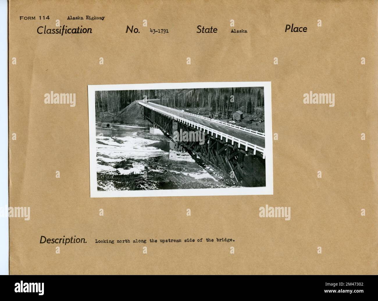 Treated timber truss bridge on the Alaska Highway. Original caption ...