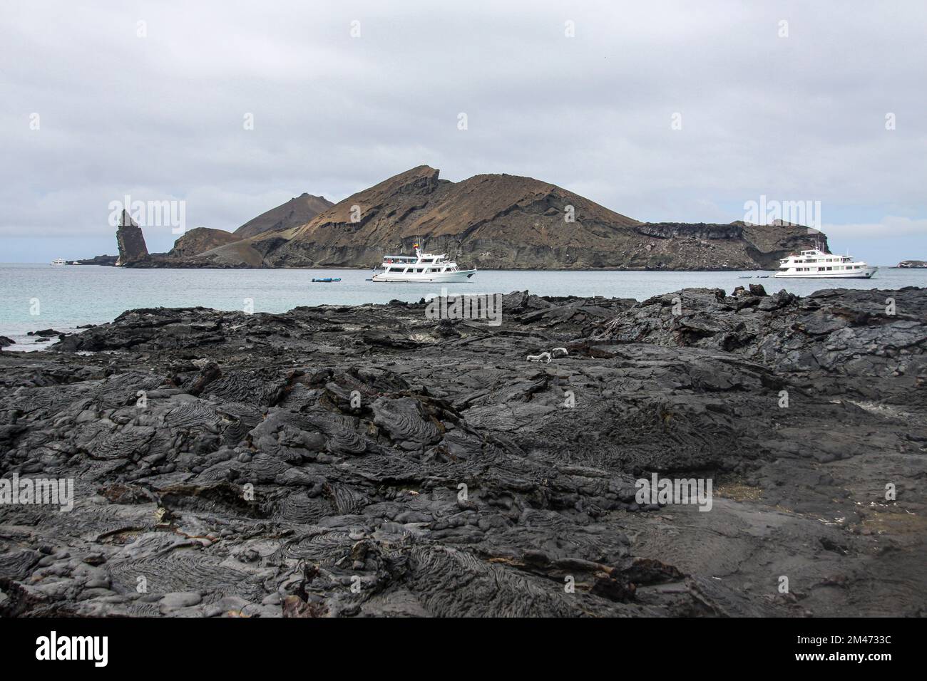 Tourist cruise boat, approach an Island in the Galapagos, Ecuador Stock ...