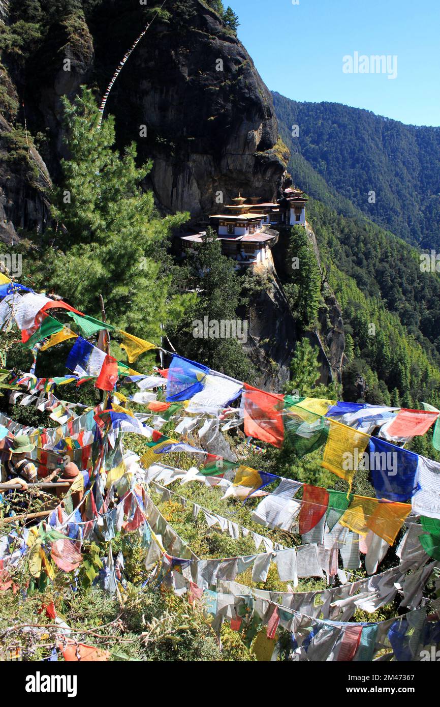 Prayer flags on the mountains of Bhutan Stock Photo - Alamy