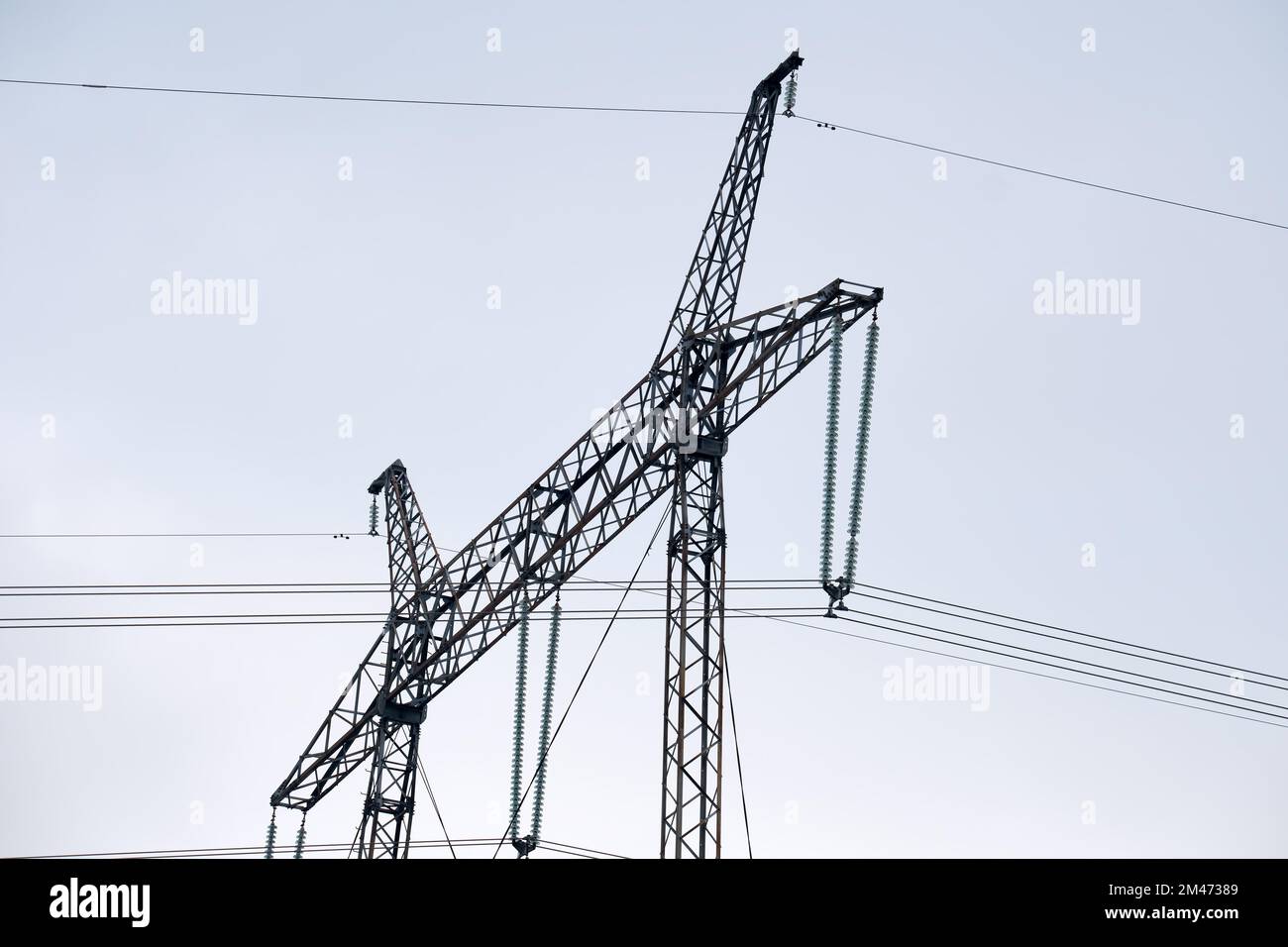 High voltage tower with electric power lines transfening electrical ...