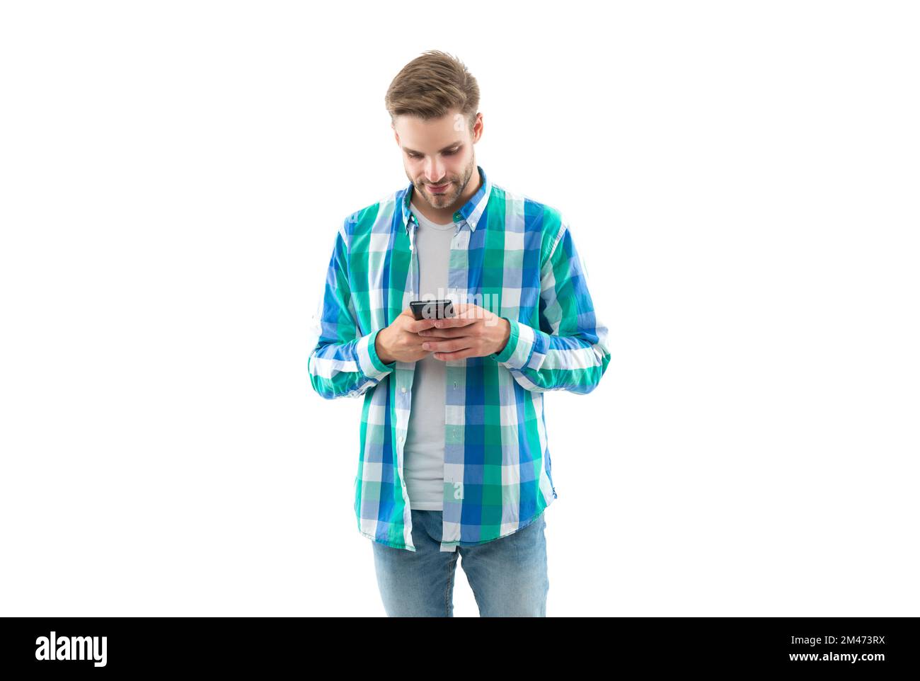 photo of man texting on cell phone. man texting on phone isolated on ...