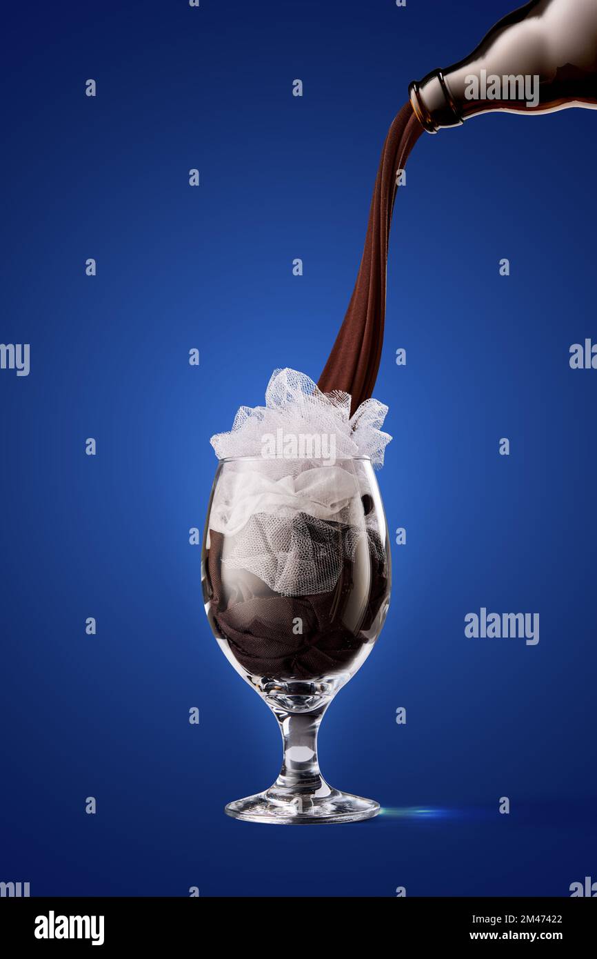 Frothy drink. Imitation of stream of dark stout pours into beer glass ...