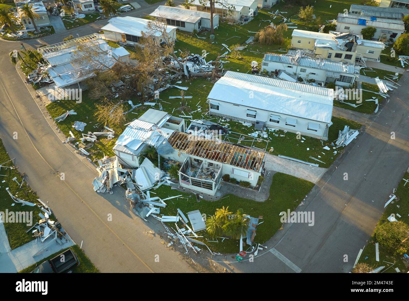Severely damaged houses after hurricane Ian in Florida mobile home ...