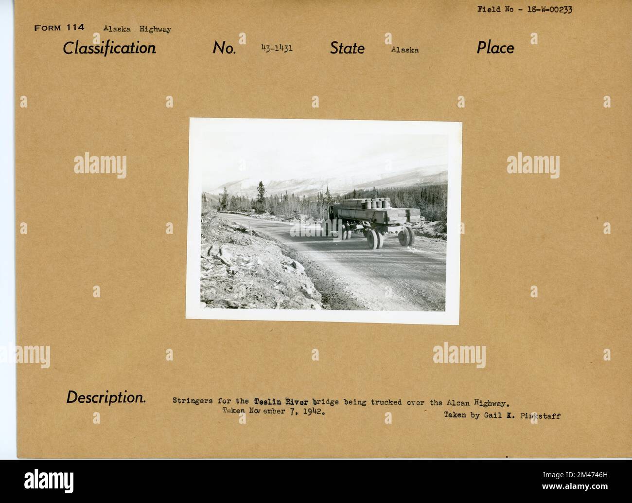 Stringers for the Teslin River Bridge. Original caption: Stringers for ...