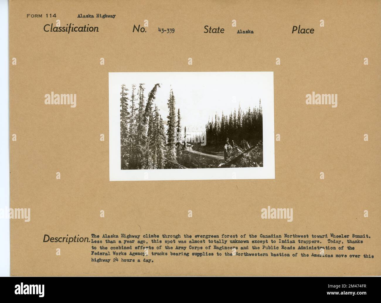 The Alaska Highway climbs through the evergreen forest. Original ...