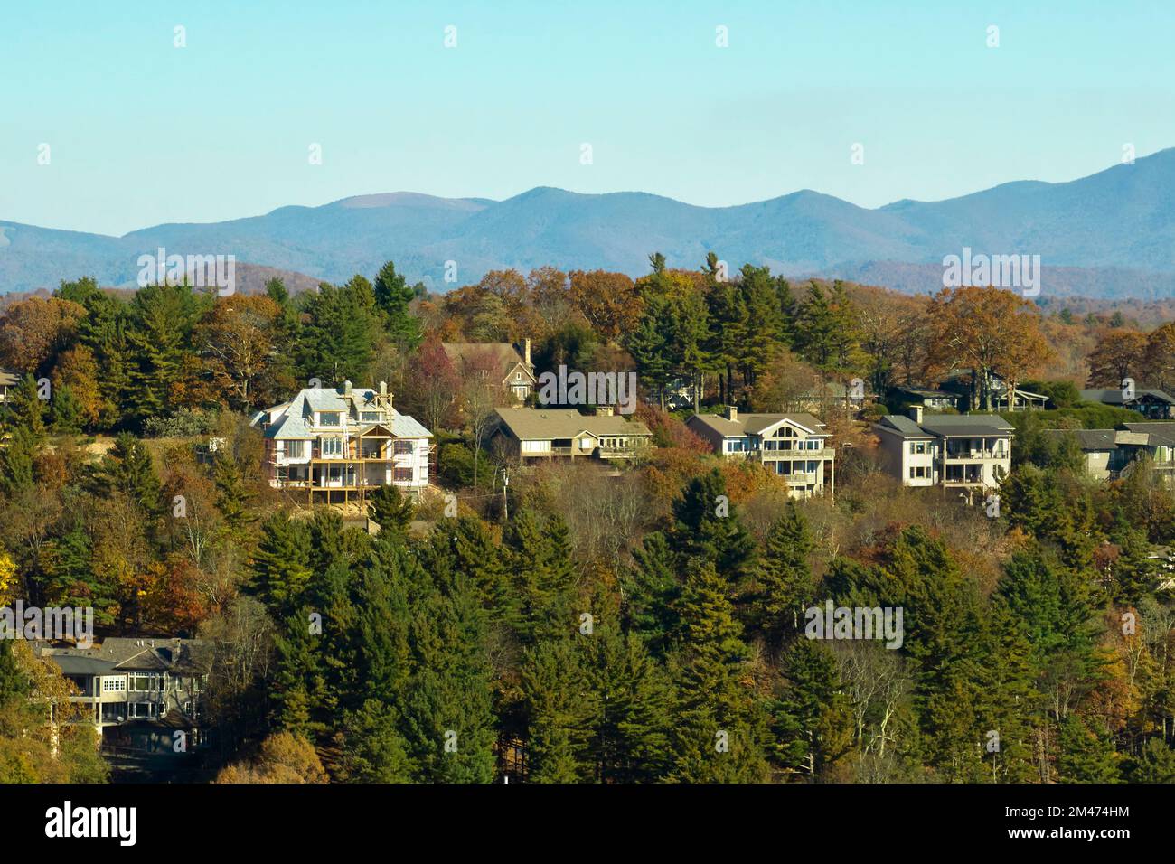 View from above of expensive residential houses high on hill top ...
