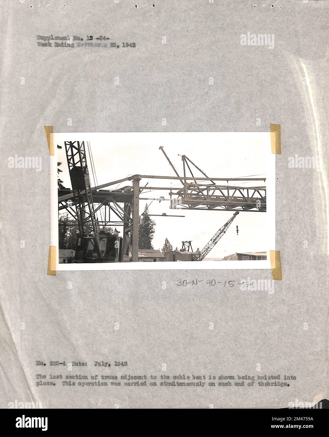 The last section of truss adjacent to the cable bent is shown being ...