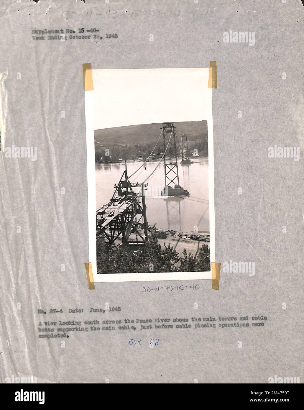 View looking south across the Peace River shows main towers and cable ...