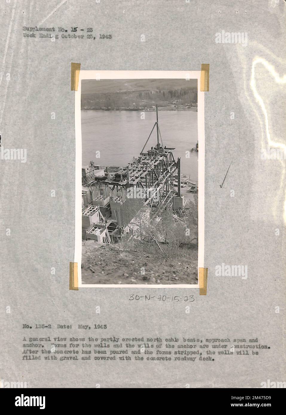 A view of the partly erected north cable bents, approach span and ...