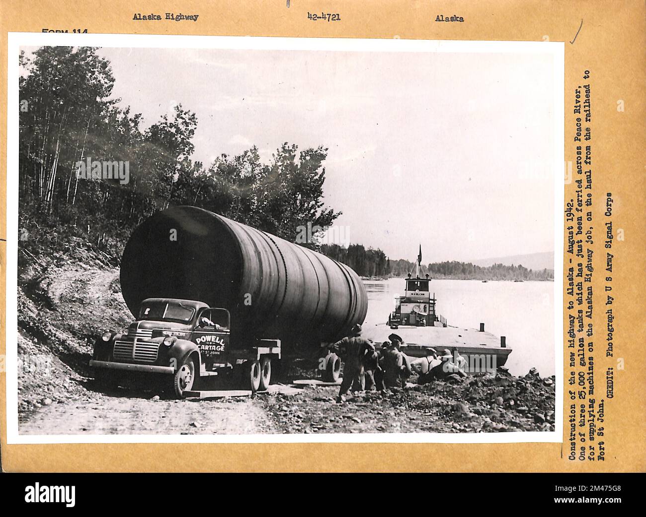One of three 25,000 gallon tanks. Original caption: Construction of the ...