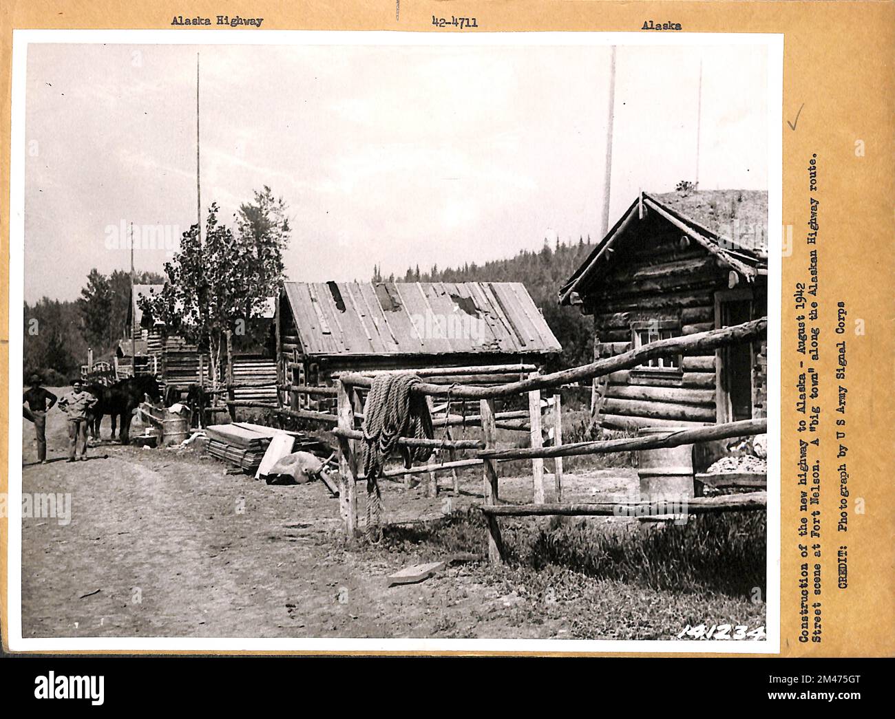 Street scene at Fort Nelson. Original caption: Construction of the new ...