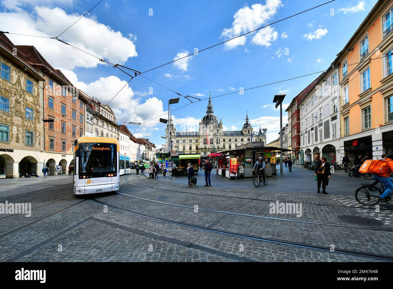 Graz, Austria - September 22, 2022: Town hall, market and public tram ...