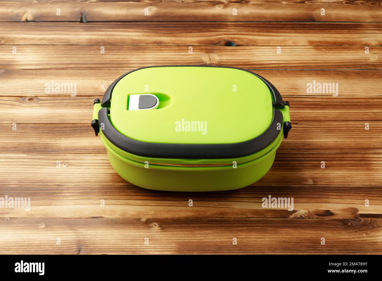 New empty plastic lunch box on a wooden background Stock Photo - Alamy