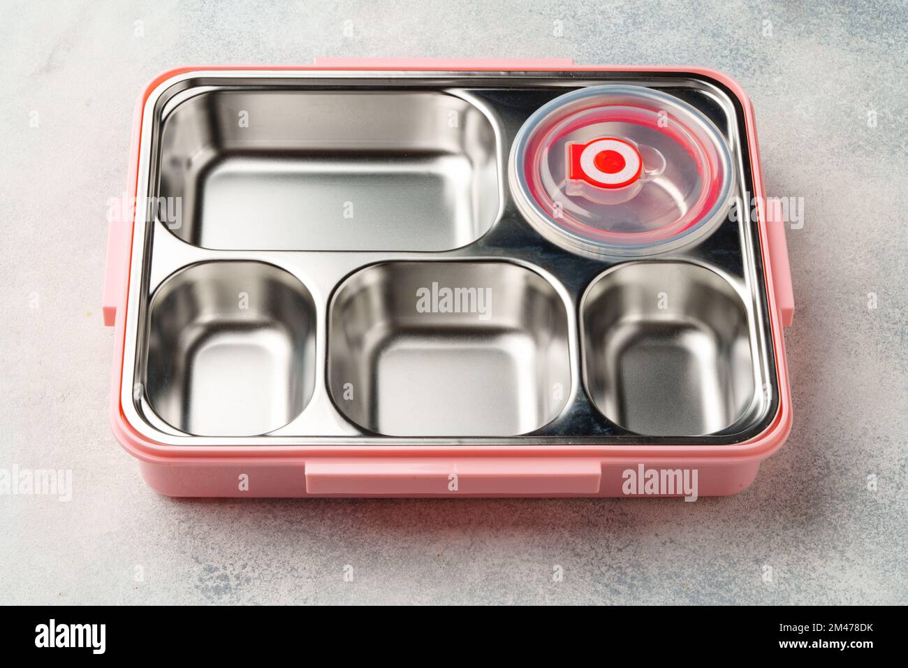 Plastic empty lunch box with metal compartments Stock Photo - Alamy