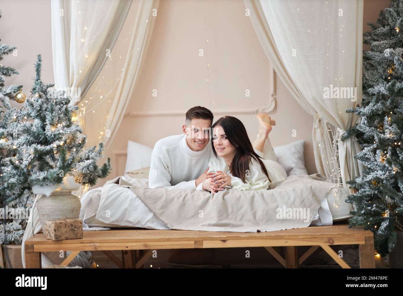 Smiling charming girlfriend feeling happiness being with her boyfriend ...