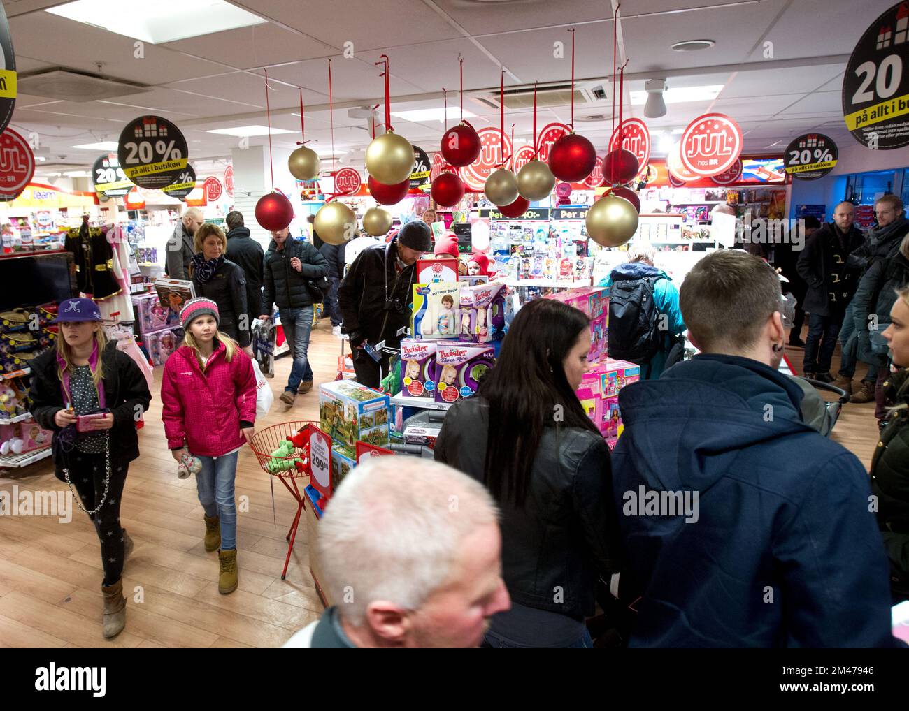 Christmas shopping in a toy store Stock Photo - Alamy
