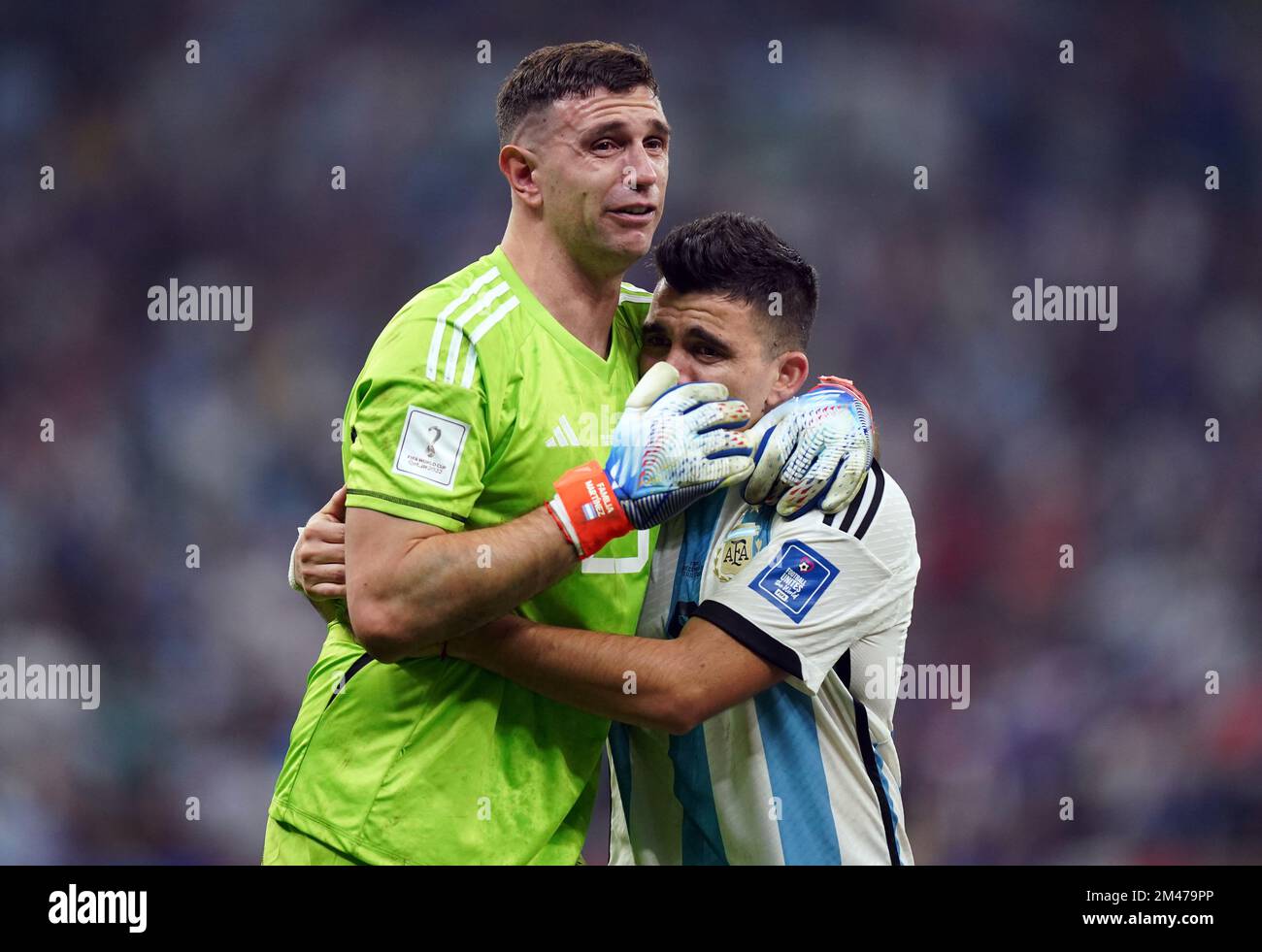 Argentina goalkeeper Emiliano Martinez (left) celebrates victory over ...