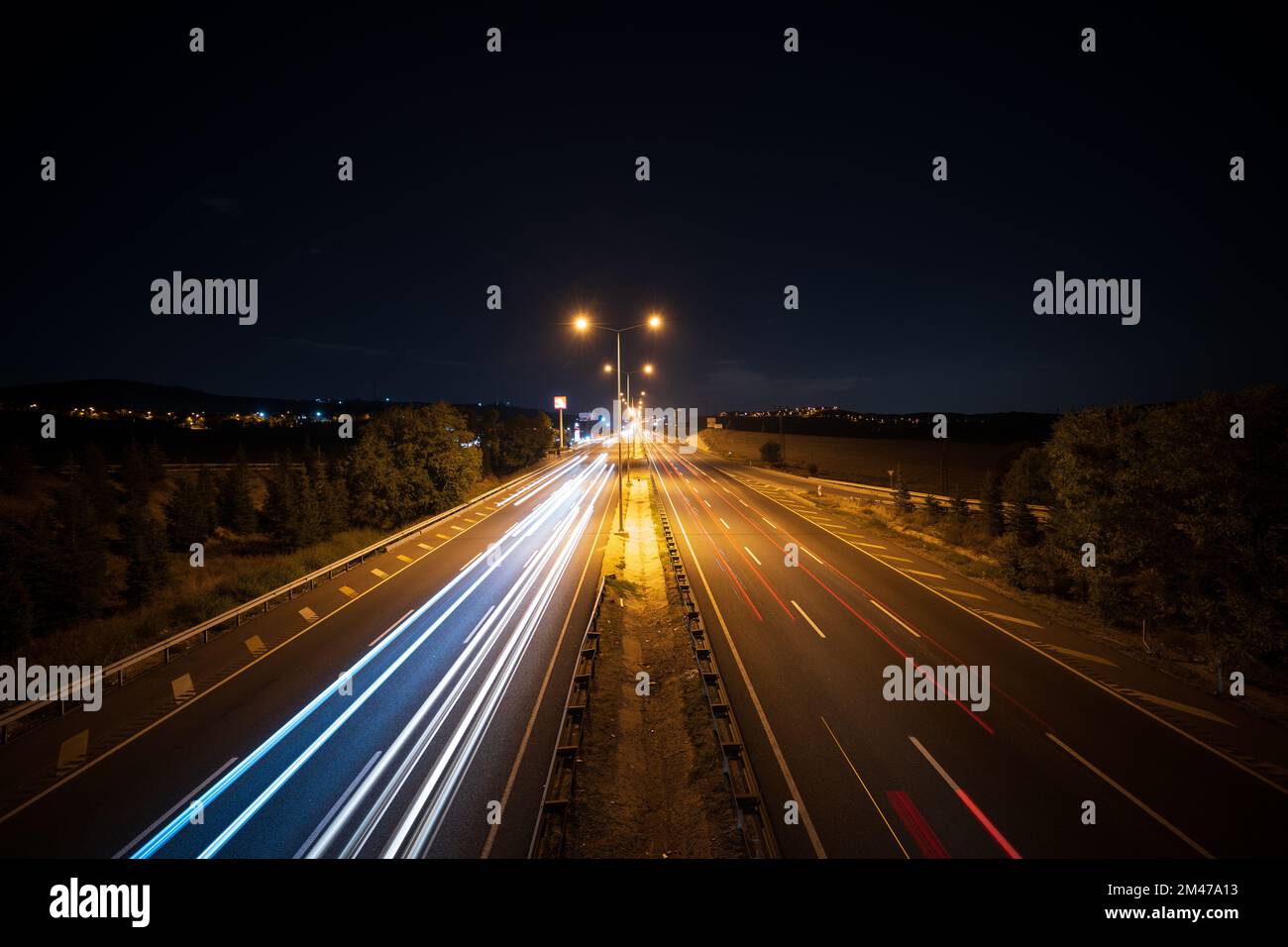 Highway traffic in the evening. Long exposure Stock Photo - Alamy
