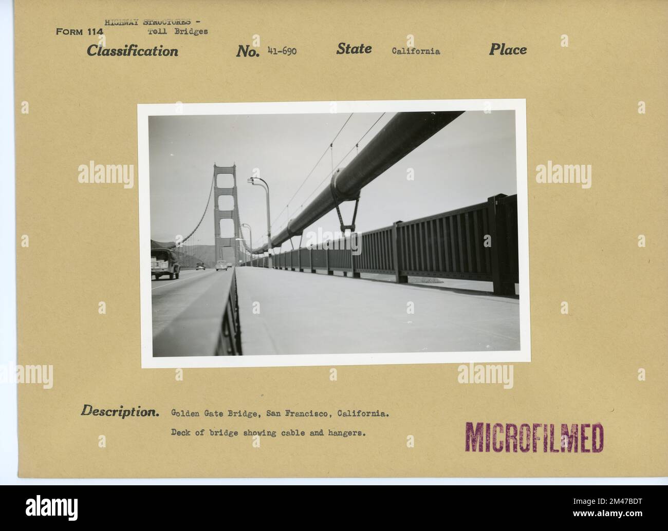 Deck of bridge showing cable and hangers, Golden Gate Bridge, San ...