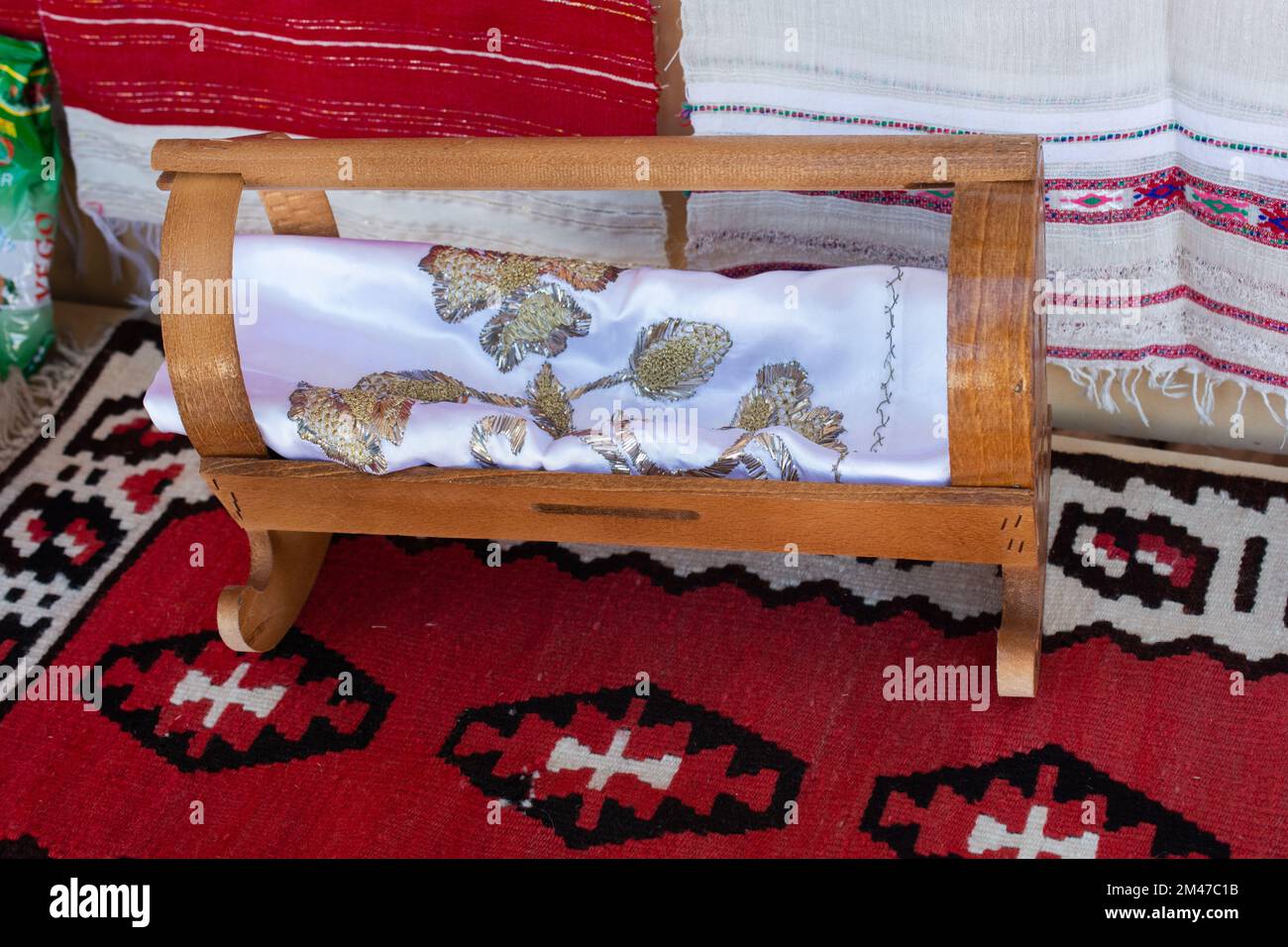 Wooden cradle of Eastern type in view Stock Photo - Alamy