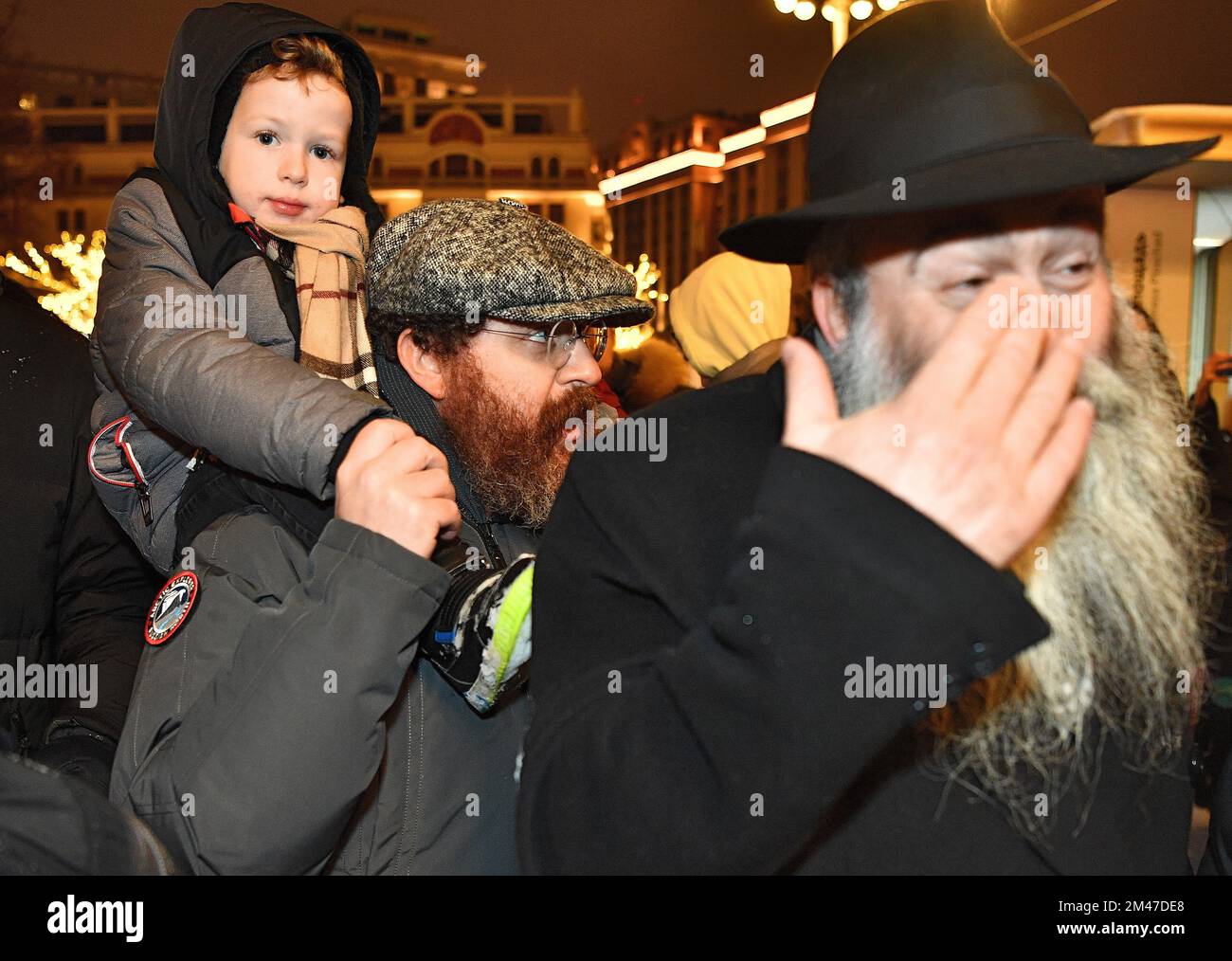 The ceremony of lighting Hanukkah candles, timed to coincide with the ...