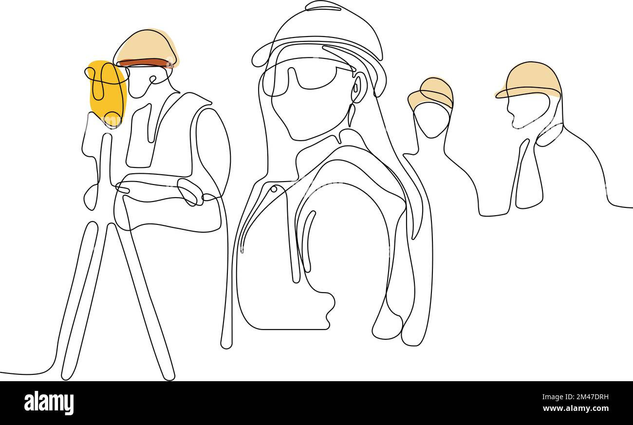 Close up of young Caucasian worker with helmet on head using tablet for ...