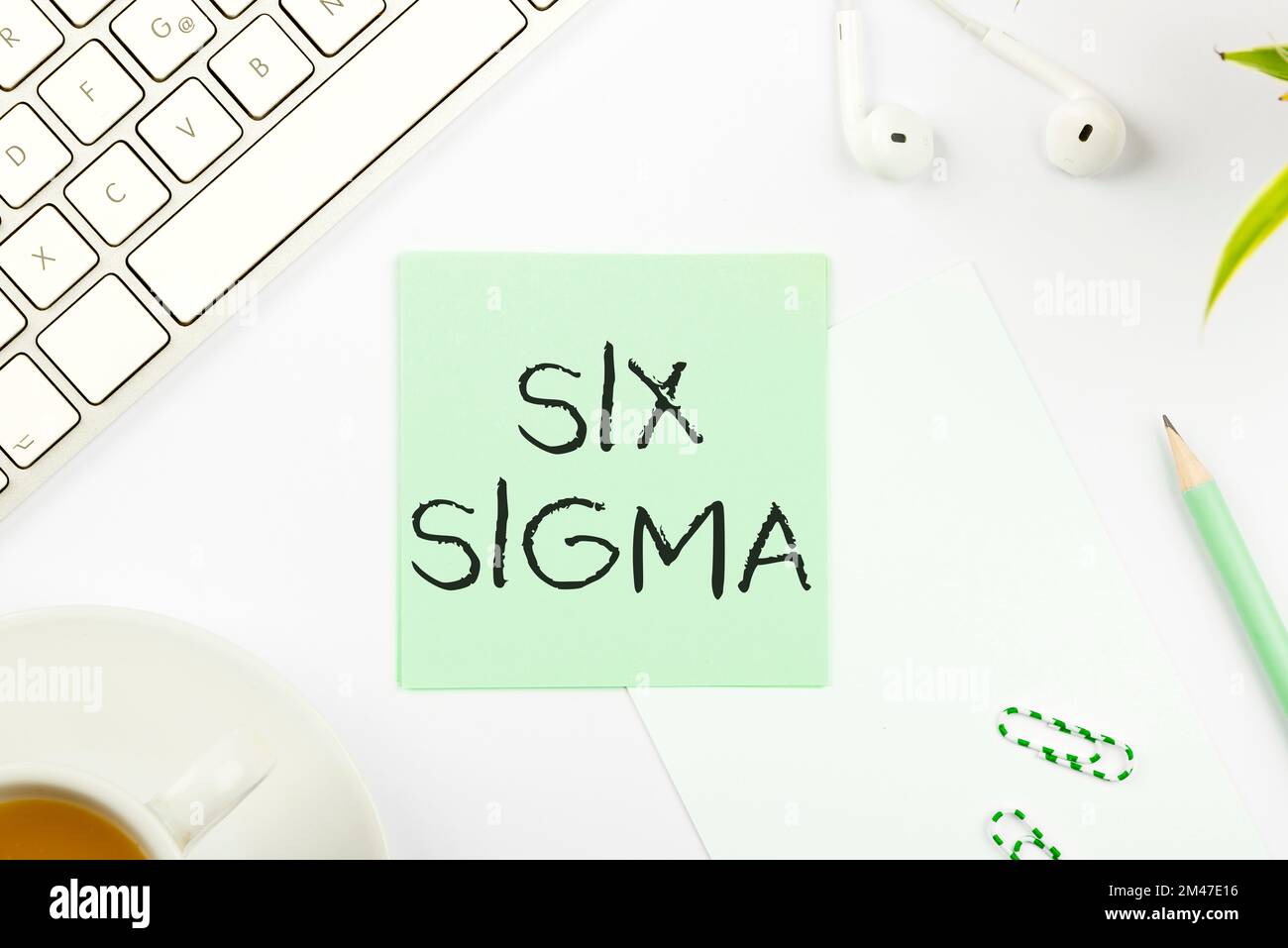 Handwriting text Six Sigma. Word for management techniques to improve ...