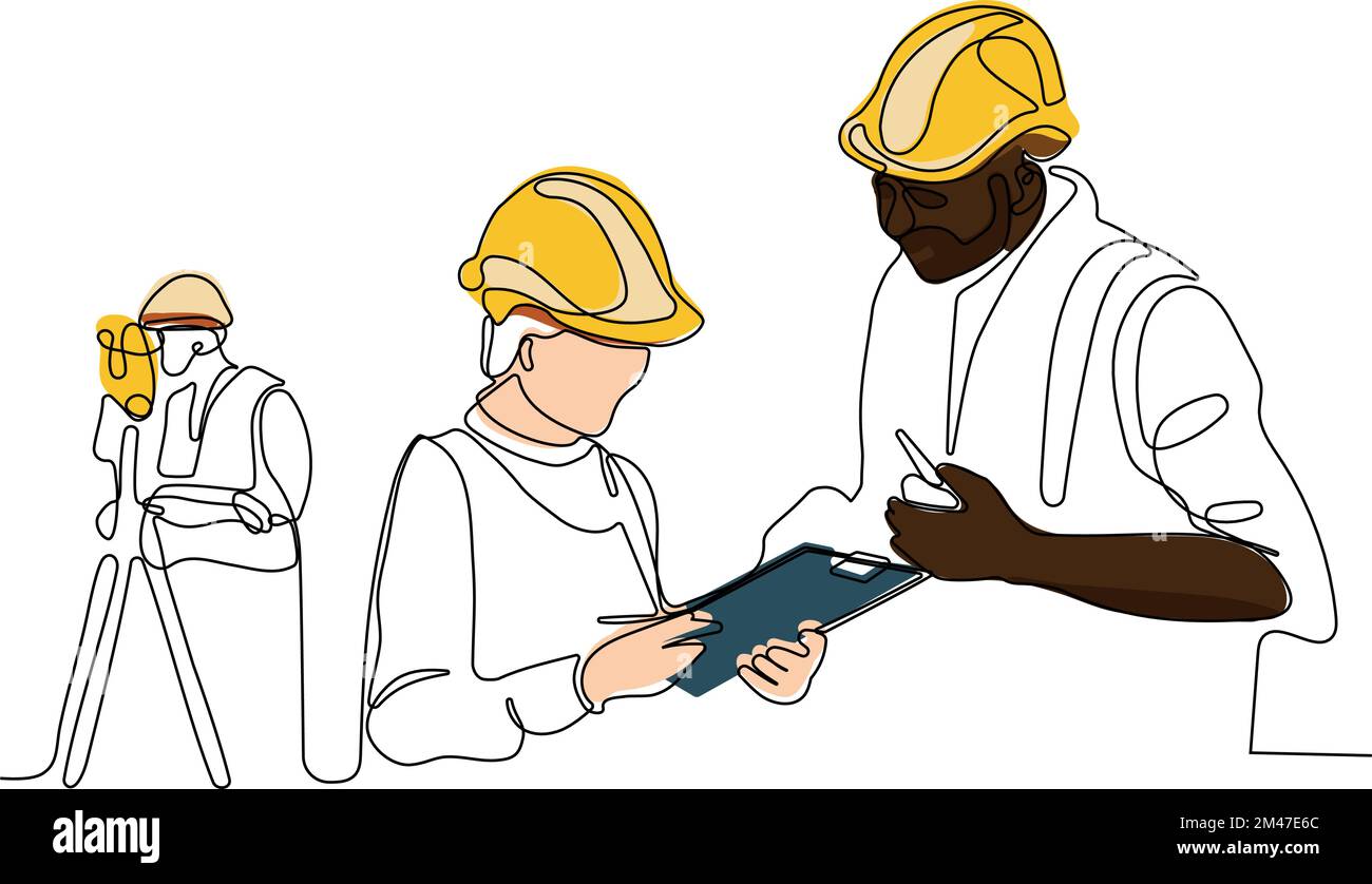Close up of young Caucasian worker with helmet on head using tablet for ...