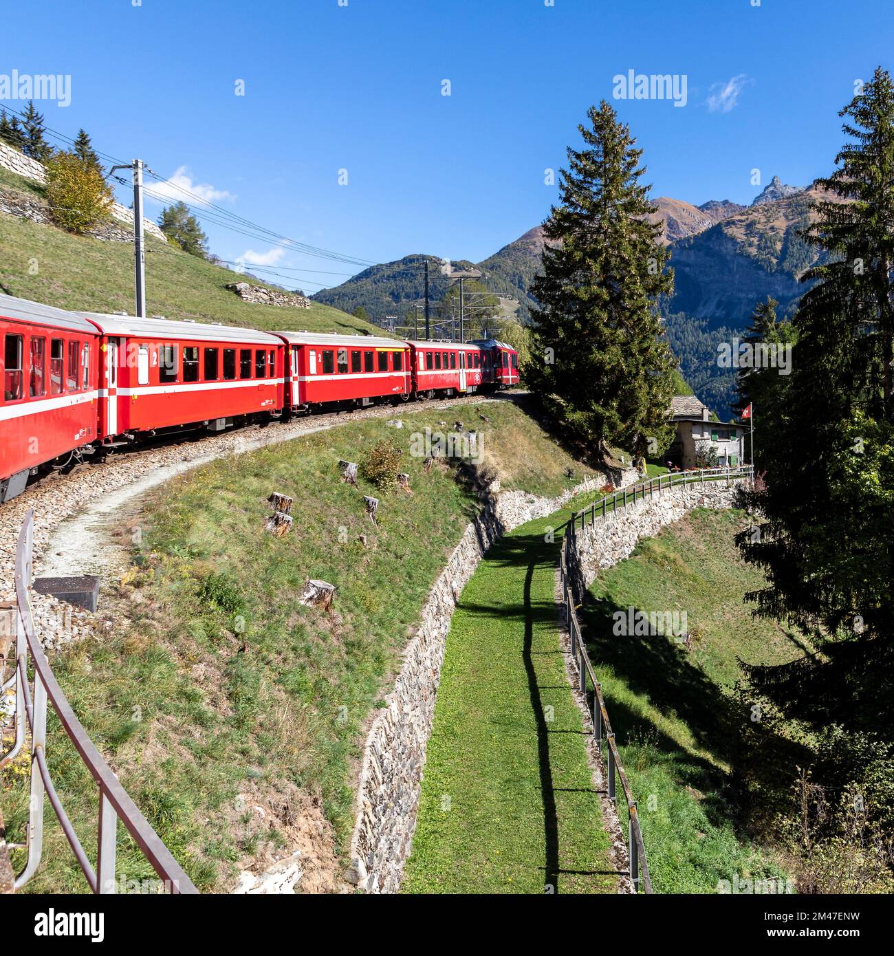 bernina express mountain railway train passing above san carlo Stock ...