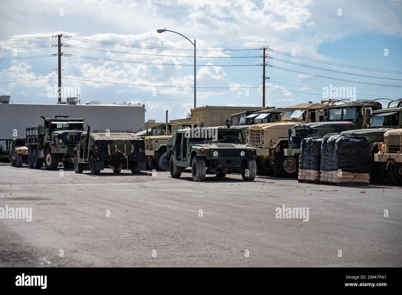 Mechanical workshop of a military base, various light vehicles and ...
