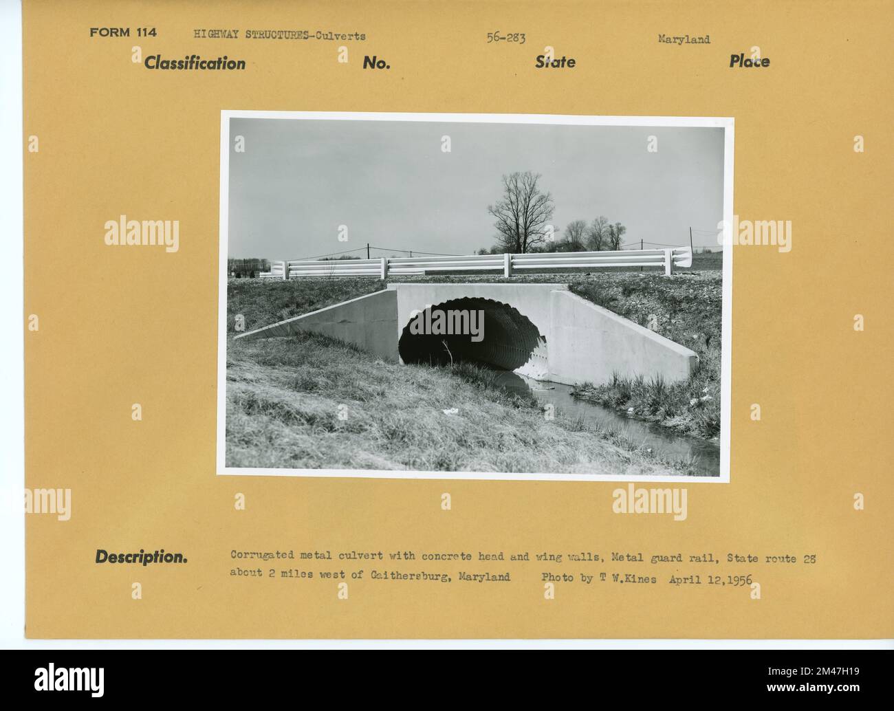 Corrugated metal culvert with concrete head and wing walls, Metal guard ...