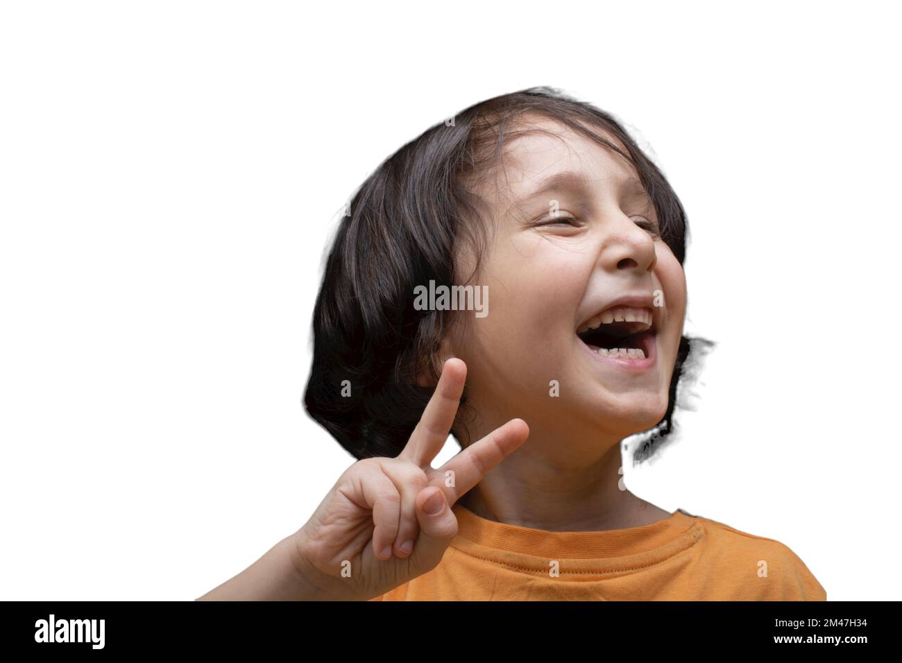 boy making victory sign isolated on a white background. Cute happy ...