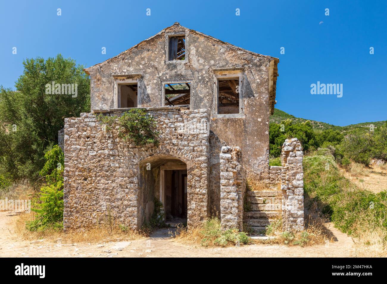 Ruins of the abandoned village of Perithia, Corfu, Greece Stock Photo ...