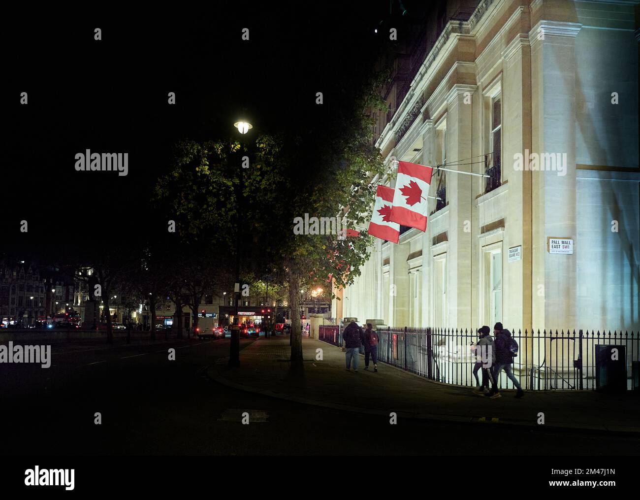 Flags outside the Canadian embassy at Trafalgar Square, London England ...