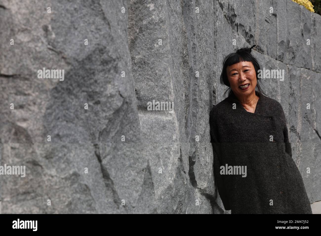 Artist Lindy Lee poses for a picture at Peak Tram Central Terminus in ...