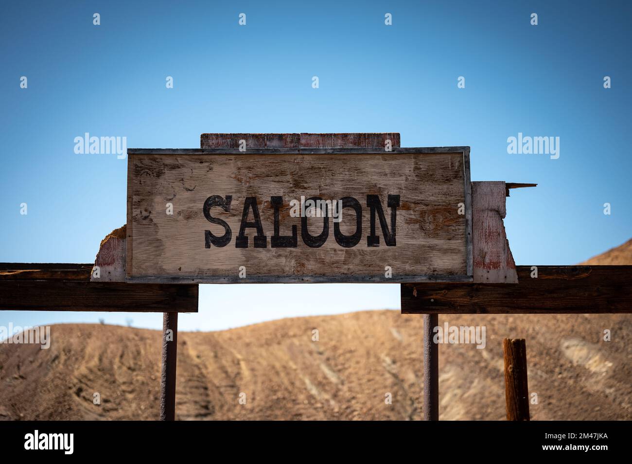 Saloon Sign in Old Wild West Ghost Town Stock Photo - Alamy
