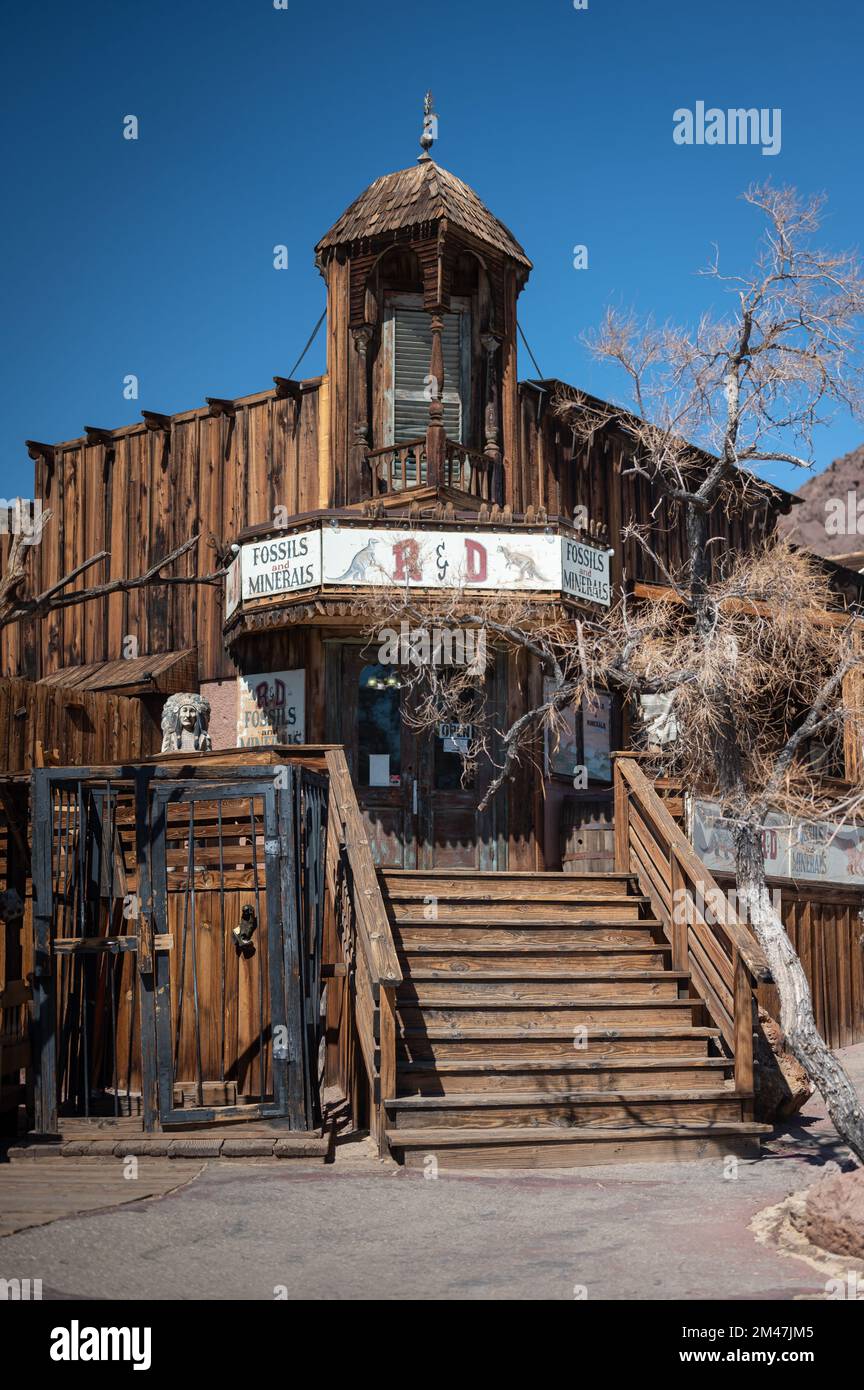 Old Wild West frame house with a nice bamcony in the corner Stock Photo ...